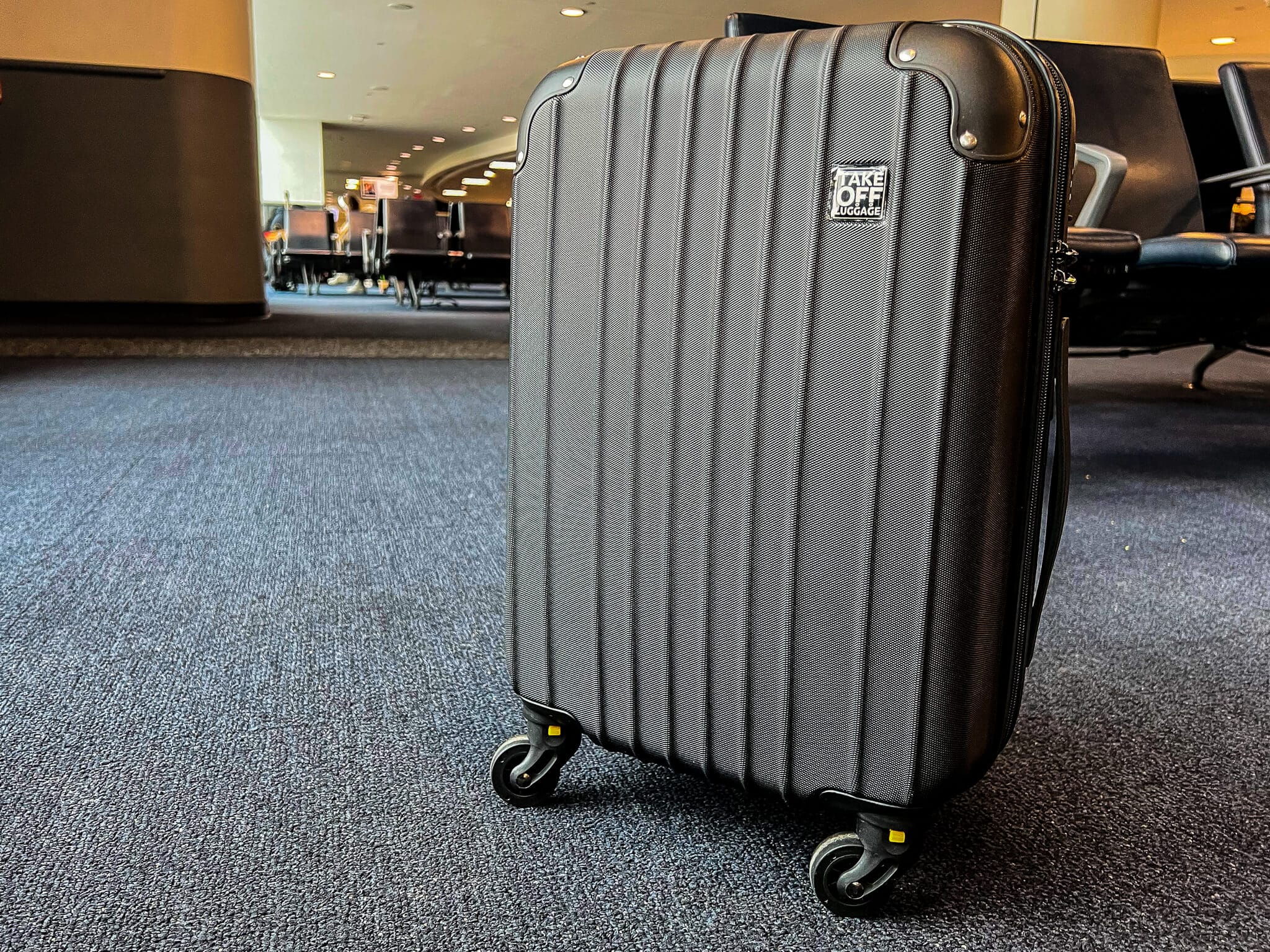 Wheels Up! A High-Flyer’s Take OFF Luggage Review — The Purposely Lost